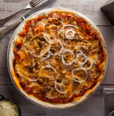 Receta de pizza de anchoas, la pizza puttanesca - Unareceta.com