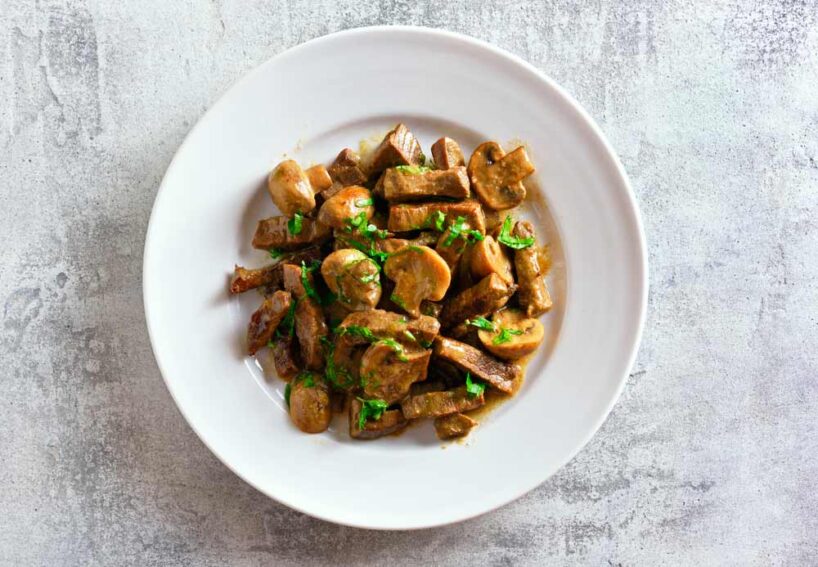 👉 Receta de SECRETO IBÉRICO al horno con setas - Unareceta.com